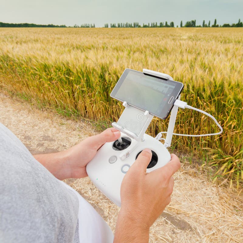 Unmanned Copter. Man Controls Quadrocopter Flight Stock Image - Image ...