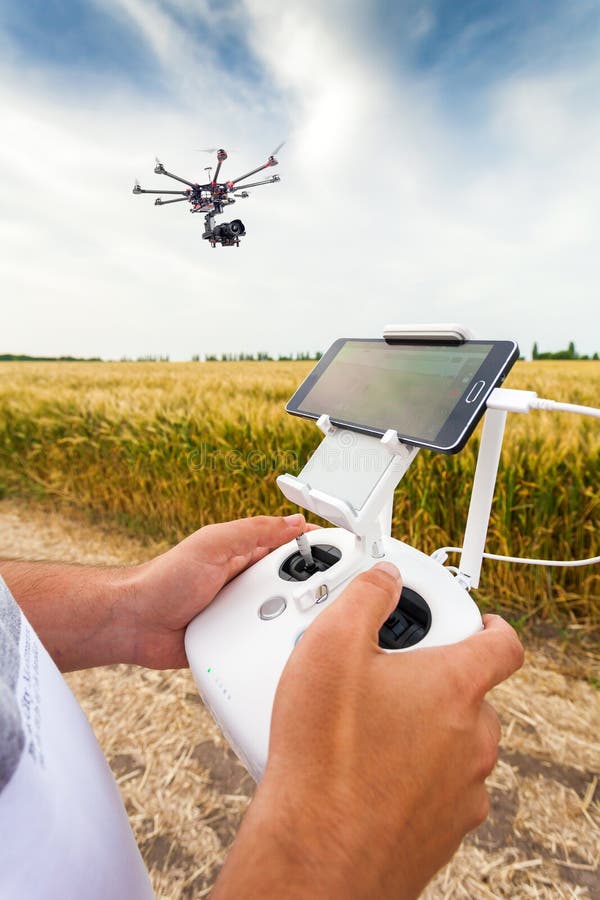 Unmanned Copter. Man Controls Quadrocopter Flight Stock Image - Image ...