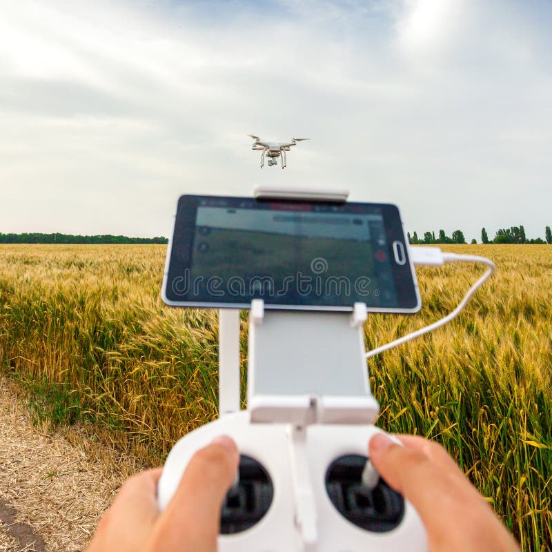 Unmanned Copter. Man Controls Quadrocopter Flight Stock Photo - Image ...
