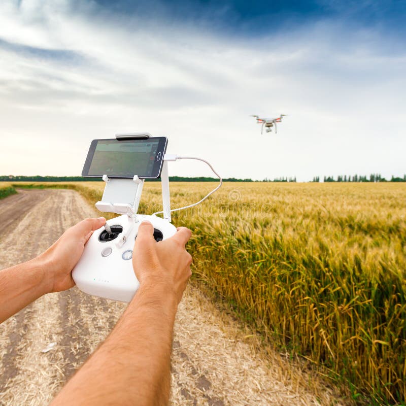 Unmanned Copter. Man Controls Quadrocopter Flight Stock Photo - Image ...