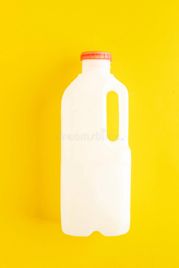 Unmarked Biodegradable Plastic Milk Bottle on a Yellow Background ...