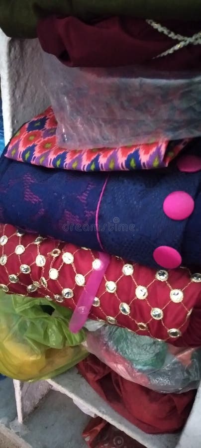 Unorganized Dresses in Shelves Image Stock Photo - Image of ...