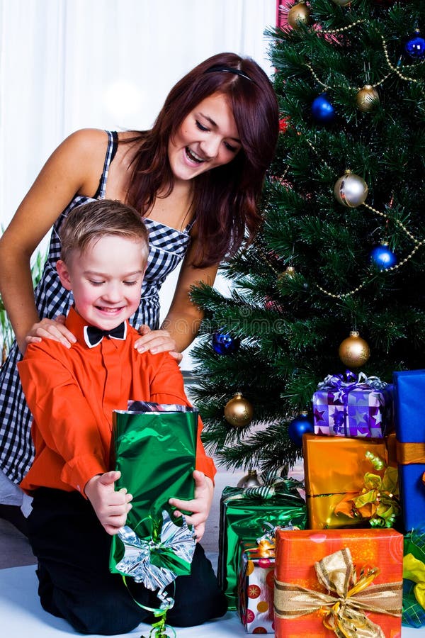 Unpack gifts stock image. Image of cheering, christmas - 7505749