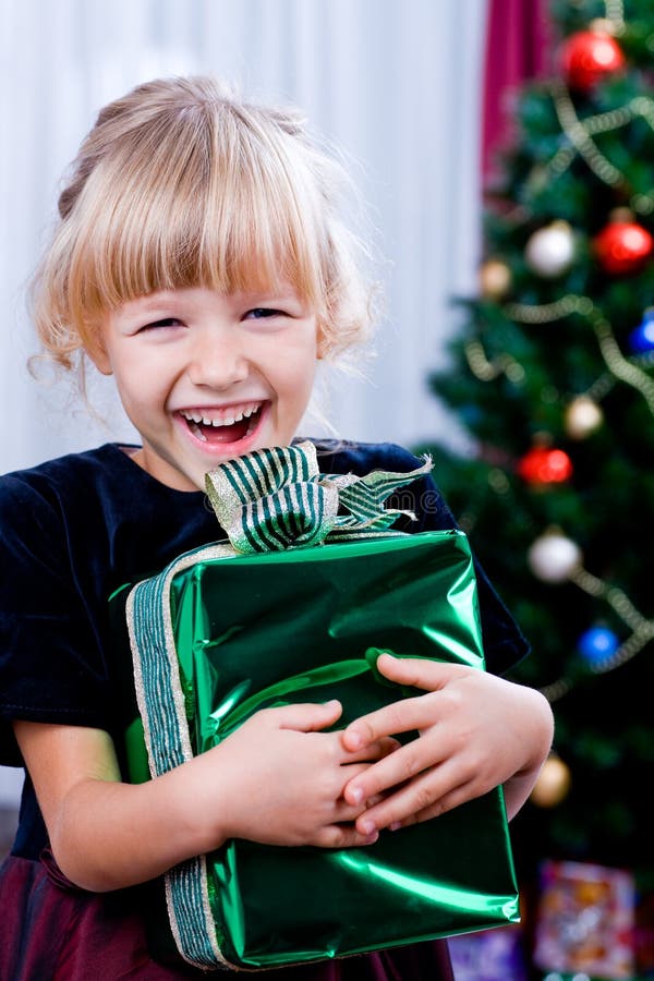 Unpack gifts stock image. Image of smile, present, holiday - 7514549