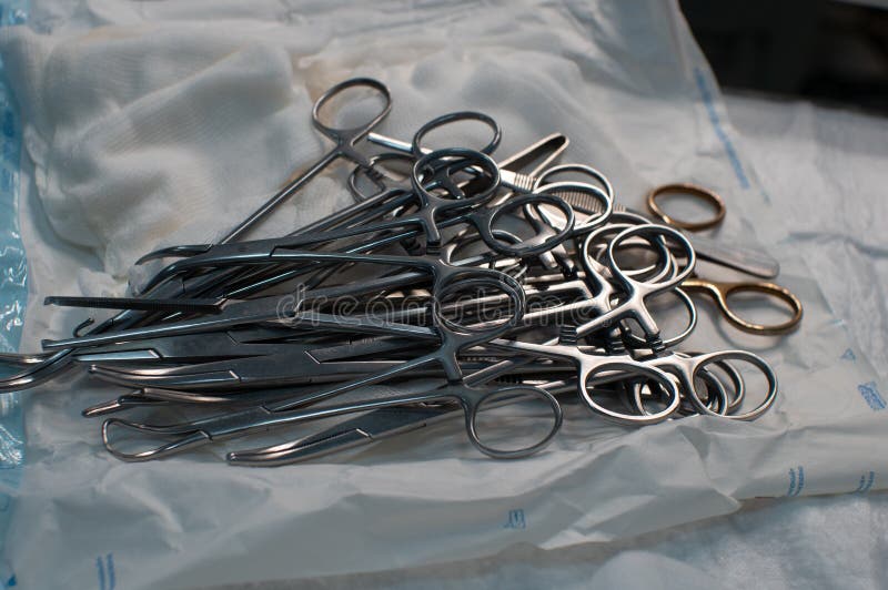 Unpacked Set of Sterile Surgical Instruments on the Table. a Surgical ...
