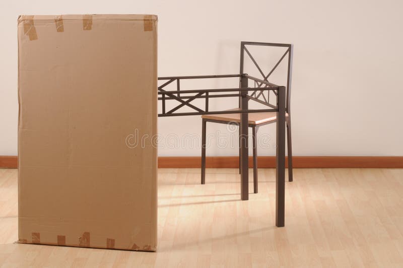 Unpacking. stock image. Image of chair, carton, table - 12785781