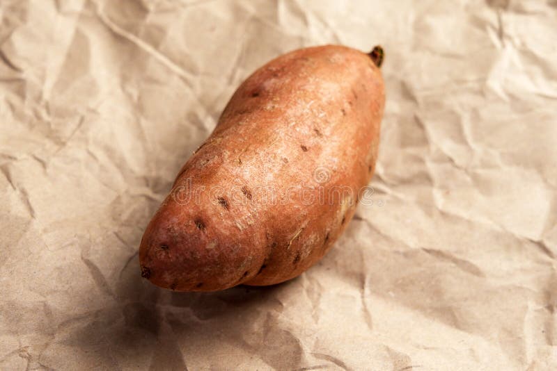 Unpeeled Sweet Potato on Paper. Fresh Batata Root Stock Image - Image ...