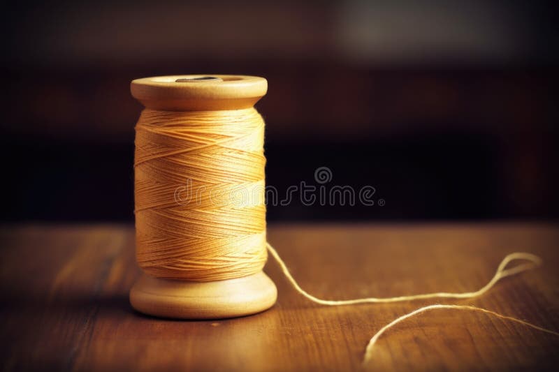 Unraveled spool of thread stock photo. Image of unravelled - 291656052
