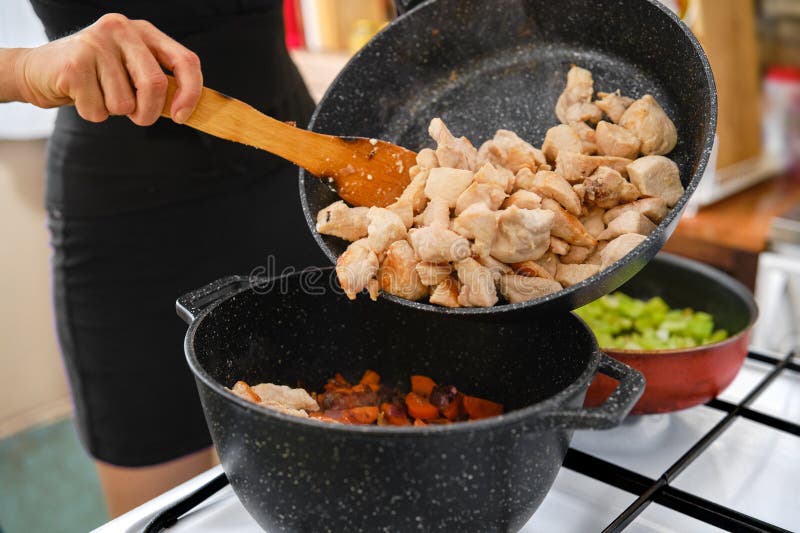 Unrecognisable Woman Transfers Fried Chicken Chunks into a Deep Pan ...