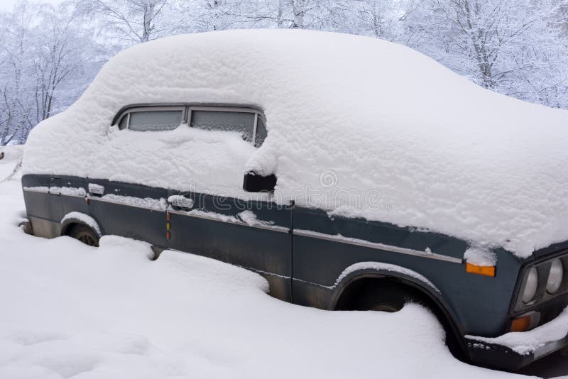 Unrecognizable Car Covered in Thick Layer of Snow in the Parking ...