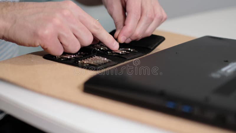 Unrecognizable Engineer Separating Computer from Case. Electronic ...