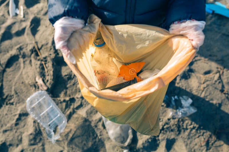 Girl Showing Garbage Collected from the Beach Stock Photo - Image of ...