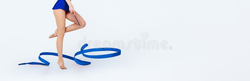 Unrecognizable Gymnast with Red Ribbon on White Studio Background ... Unrecognizable Gymnast with Red Ribbon on White Studio Background ...
