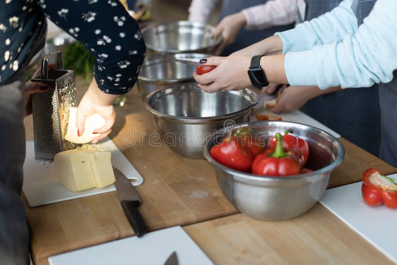 Unrecognizable Large Family Preparing Dinner for the Holiday Stock ...
