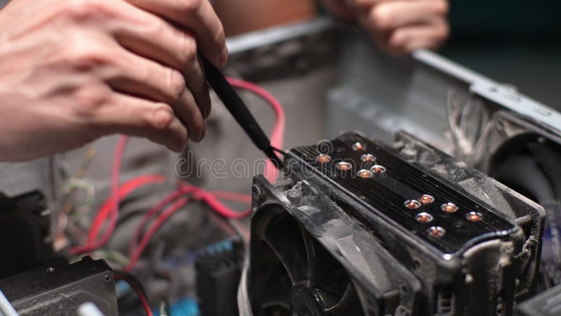 Unrecognizable Male Cleaning Inside of PC Case with Equipment Units ...