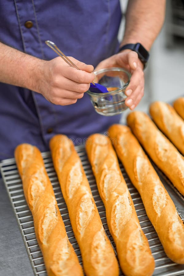 Unrecognizable Man Baker Baking and Selling Tasty Breads Stock Image ...
