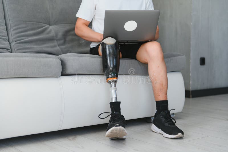 Unrecognizable Man with Bionic Prosthetic Leg at Home Indoors, Copy ...