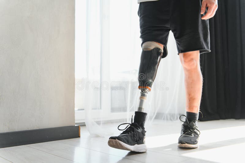 Unrecognizable Man with Bionic Prosthetic Leg at Home Indoors, Copy ...