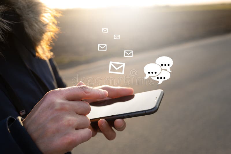 Unrecognizable Man Holding a Smartphone and Getting Notifications while ...