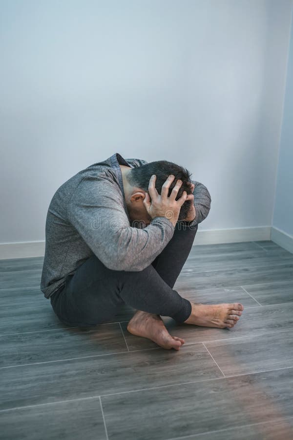 Unrecognizable Man with Problems Sitting on the Floor Stock Photo ...