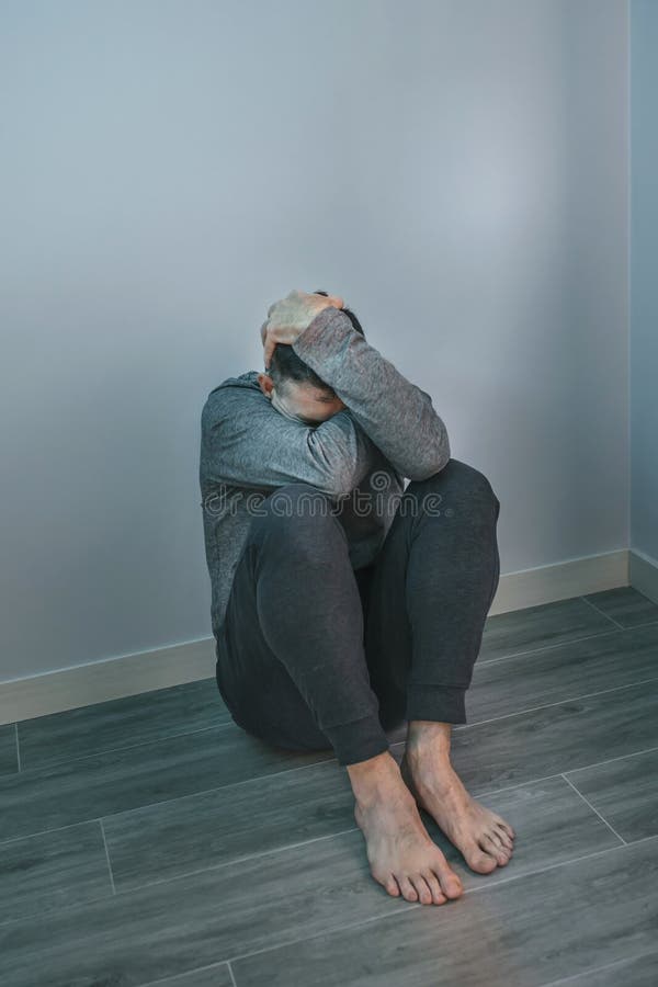 Unrecognizable Man with Problems Sitting on Floor Stock Photo - Image ...