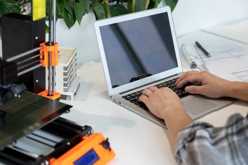 Man Typing on Laptop with Blank Screen Working in Creative Lab. Stock ...