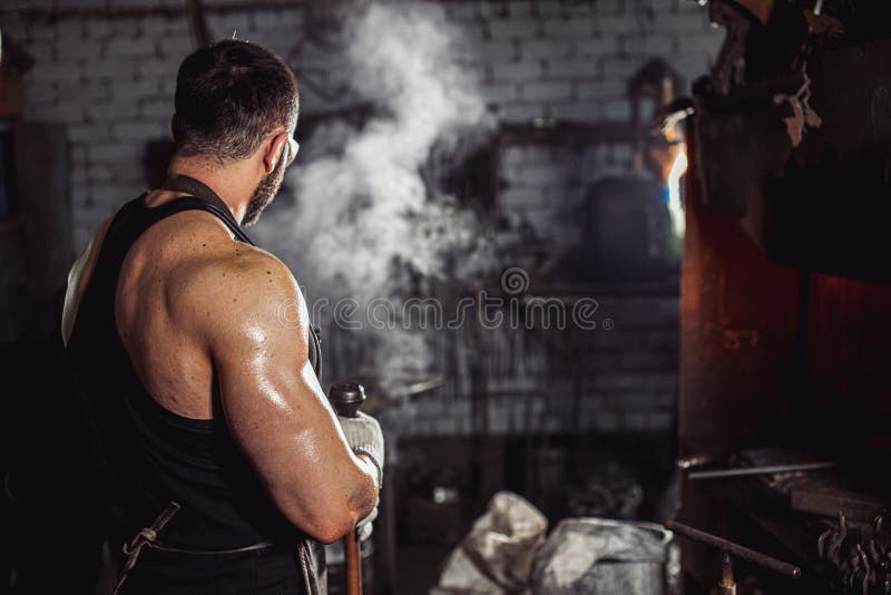 Unrecognizable Muscular Blacksmith in Workshop Stock Image - Image of ...