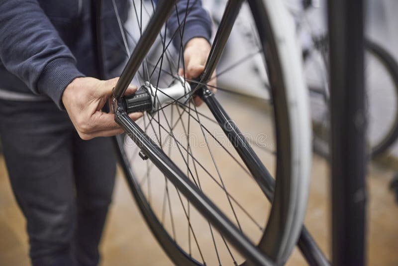Unrecognizable Person Servicing a Bicycle in His Workshop Stock Photo ...