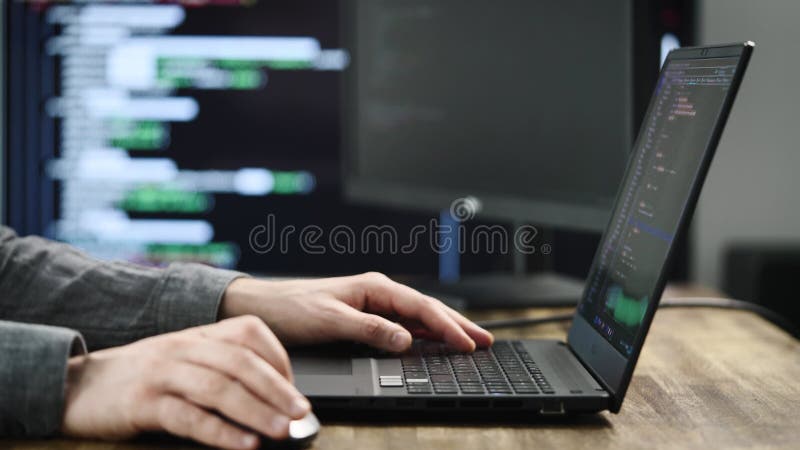Unrecognizable Programmer Developer, Writes Code. Modern Workplace with ...