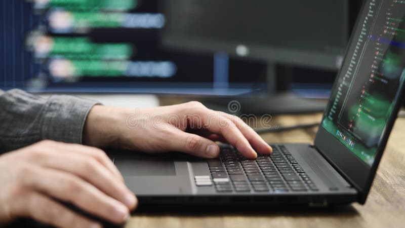 Unrecognizable Programmer Developer, Writes Code. Modern Workplace with ...