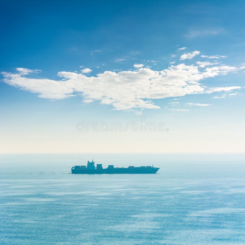 Cargo ship stand at sea stock photo. Image of delivery - 242745918