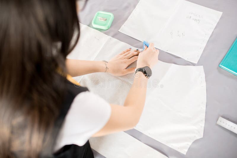 Female tailor sewing dress stock image. Image of occupation - 137116619