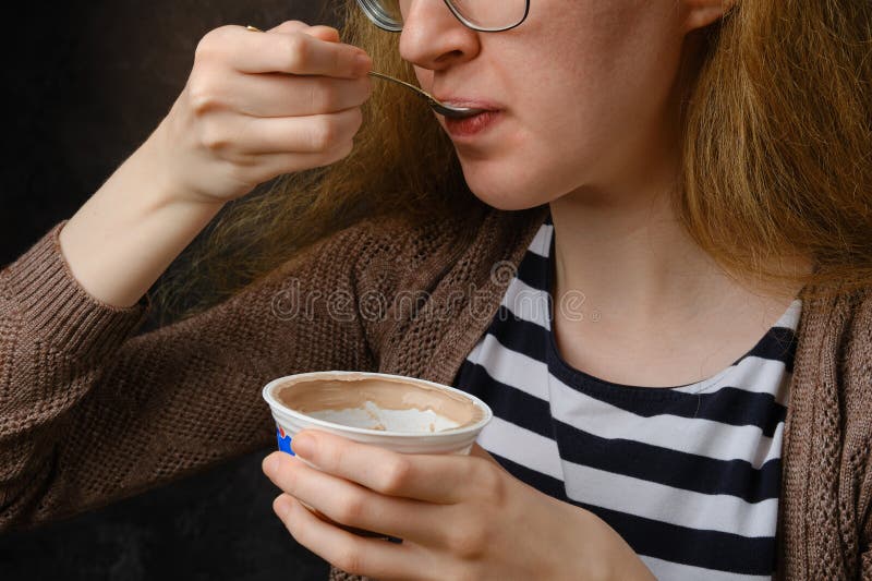 Unrecognizable Young Woman Eating Pudding Stock Photo - Image of food ...