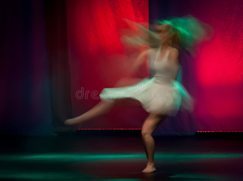 Unrecognized Woman Dancing on a Stage. Blurred Motion of Dancer Stock ...
