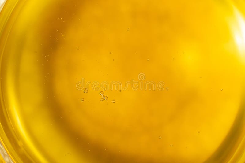 Unrefined Cold Pressed Sesame Oil in a Glass Bowl. Stock Image - Image ...