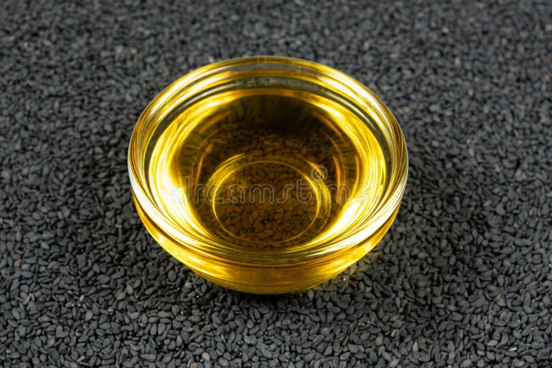 Unrefined Cold Pressed Sesame Oil in a Glass Bowl. Stock Image - Image ...