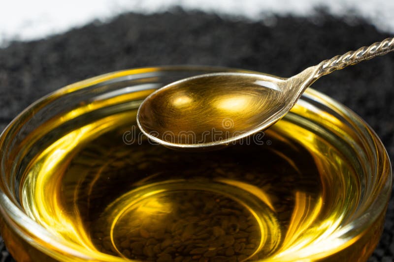 Unrefined Cold Pressed Sesame Oil in a Glass Bowl. Stock Photo - Image ...