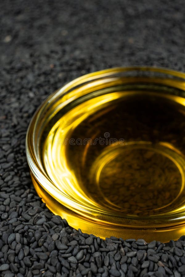 Unrefined Cold Pressed Sesame Oil in a Glass Bowl. Stock Image - Image ...