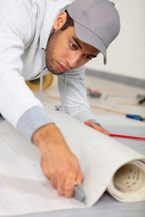Unrolling Carpet on Floor at Home Stock Image - Image of carpeting ...