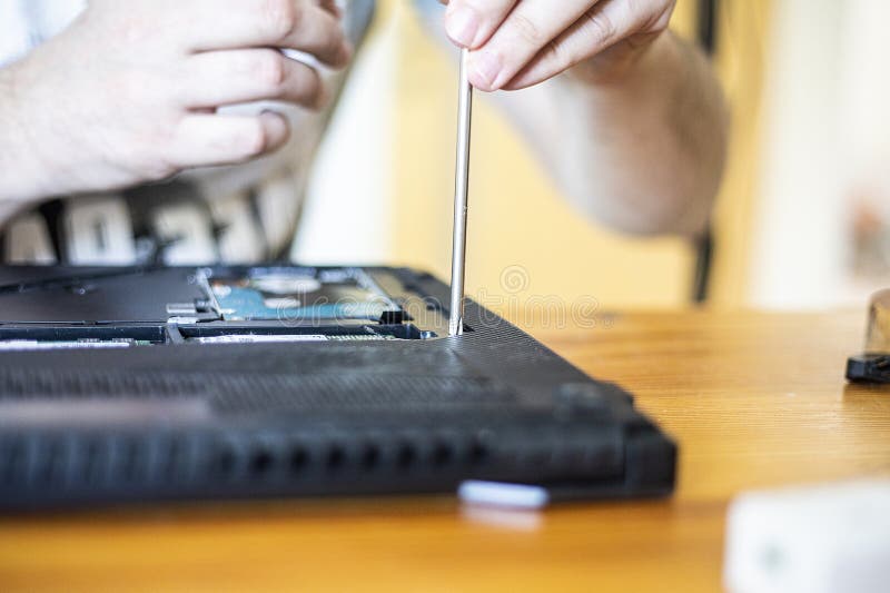 Unscrew with a Screwdriver and Remove the Base of the Laptop To ...