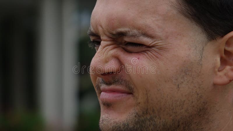 Unshaven Bearded Man Squinting Stock Image - Image of squinting, facial ...