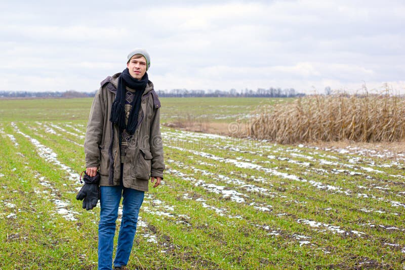 Unshaven Handsome Young Guy Stands among Spring Green Field Stock Image ...