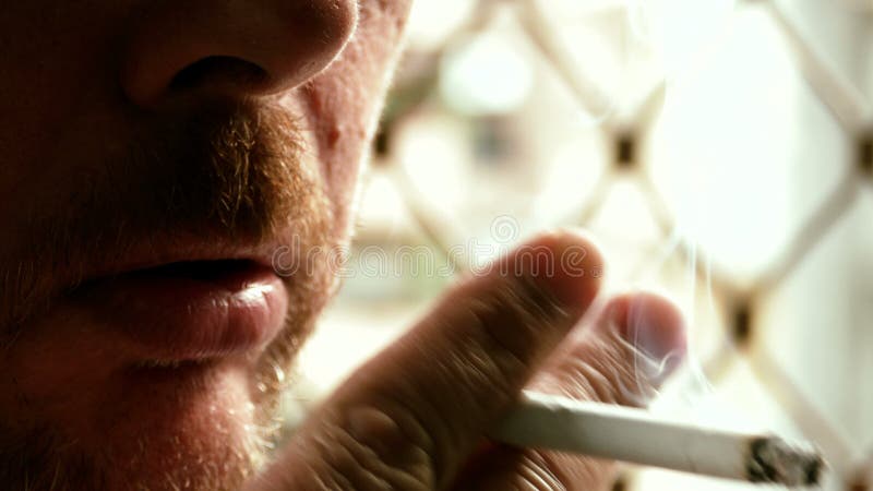 Unshaven Man Inhaling and Exhaling Cigarette Stock Video - Video of ...
