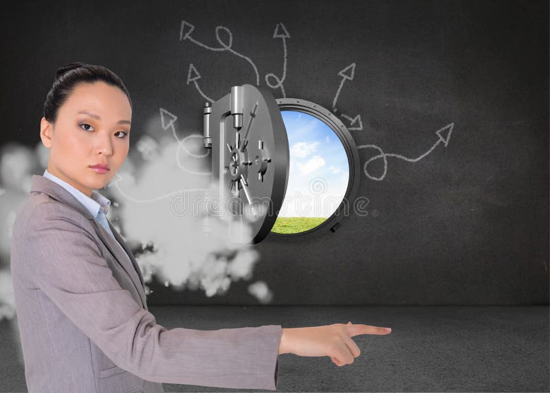 Unsmiling Asian Businesswoman Pointing Stock Image - Image of business ...