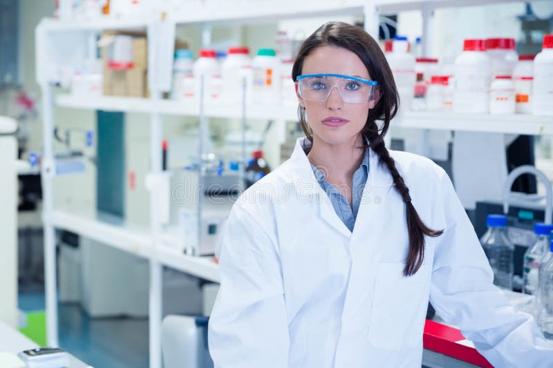 Reagent Bottles with Red Green Blue Caps are Sitting on White Bench in ...