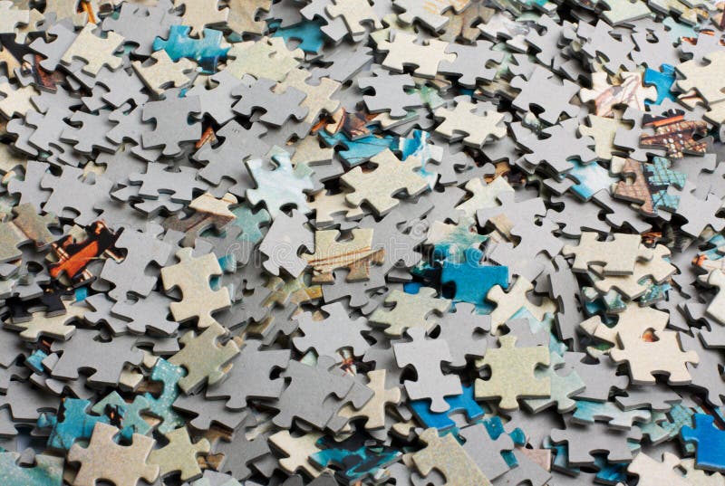 Unsolved bunch of puzzles stock photo. Image of objects - 14094984