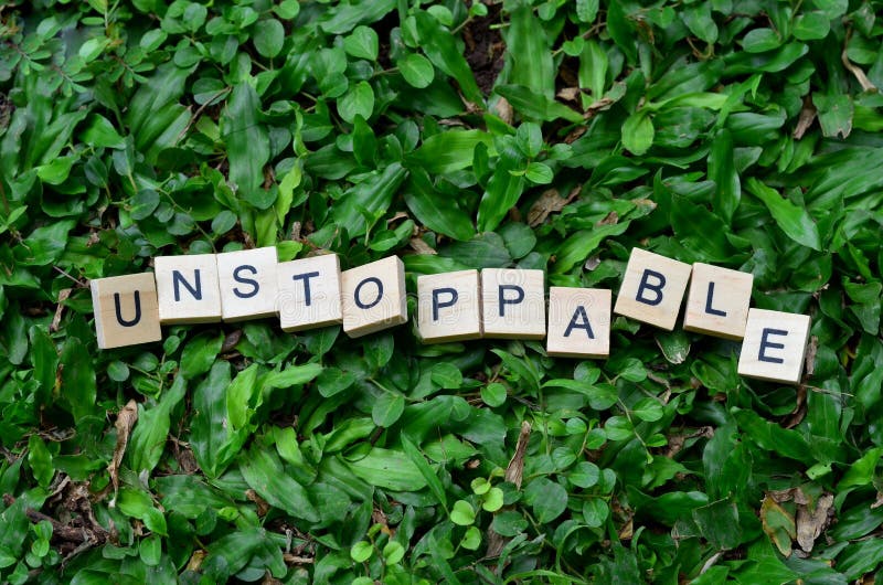 Unstoppable Text on Wooden Square, Business and Motivation Quotes Stock ...