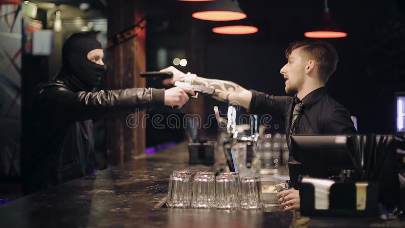 Unsuccessful Robbery Bar. the Barman Also Has a Gun Stock Video - Video ...