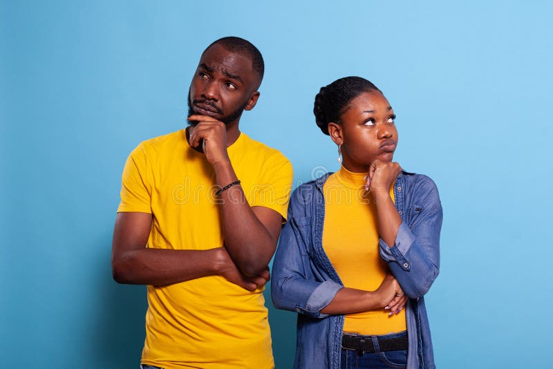 Unsure People Thinking about Clever Decision in Studio Stock Image ...