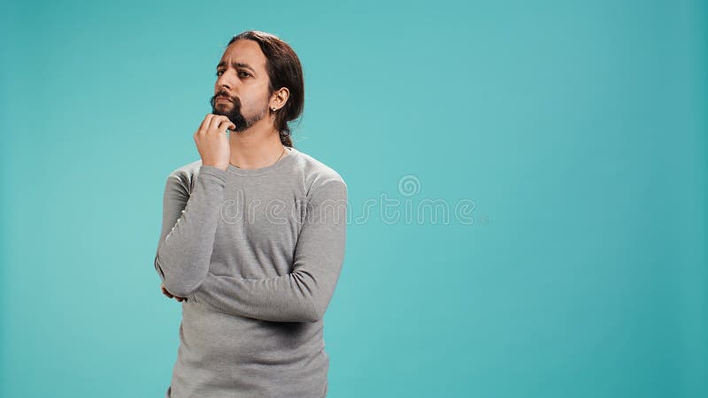 Unsure Person Doing Stroking Chin Gesture Thinking Stock Photos - Free ...